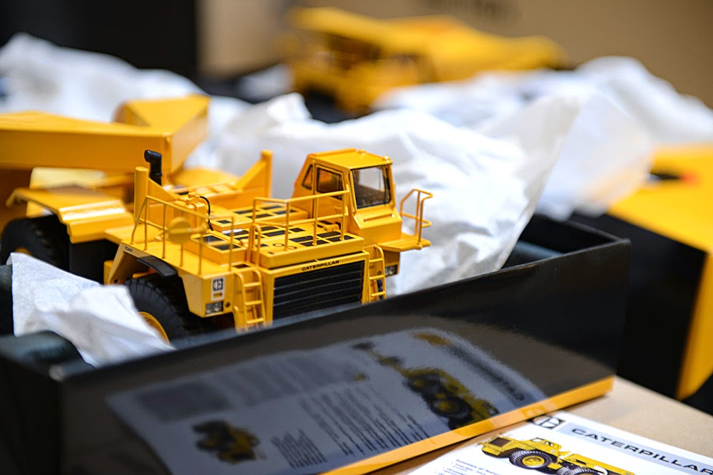 The Cat 776 and 777 trucks are here! - Classic Construction Models